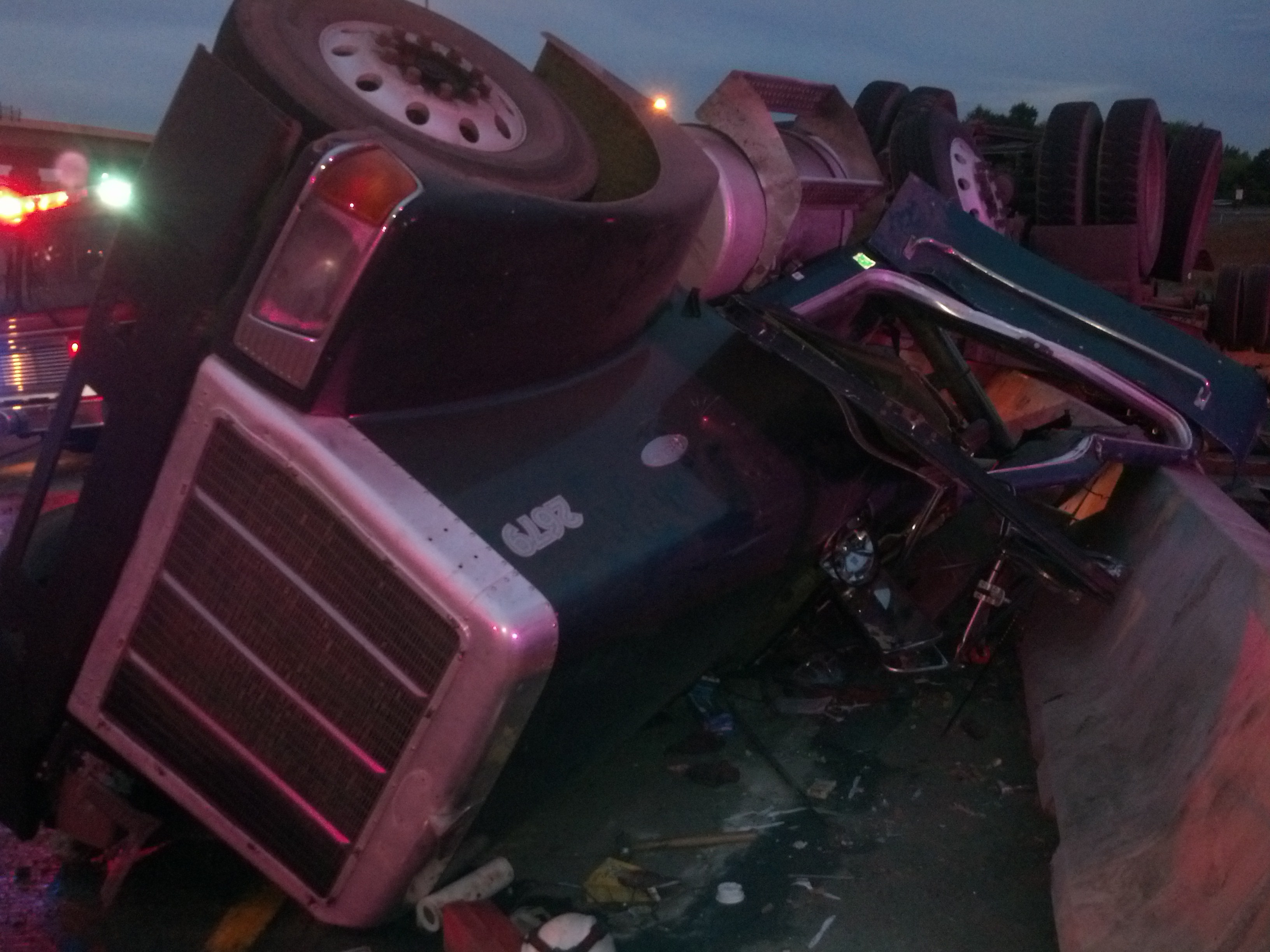 Semi truck overturns on I-5 exit, injuring driver | kgw.com