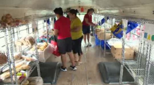 Centennial HS students turn old bus into food bank | kgw.com